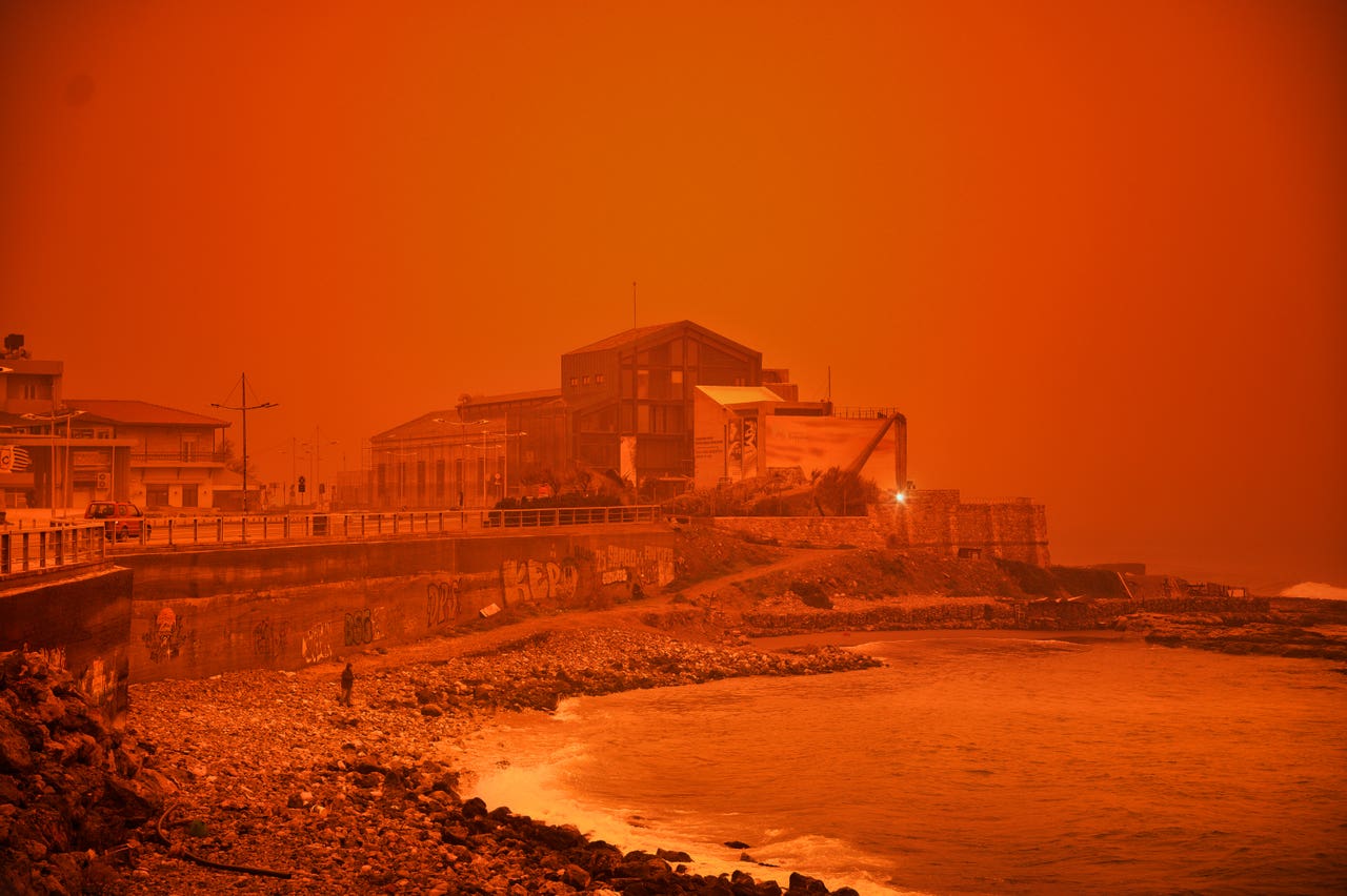 Saharan dust storm turns sky red over holiday island of Crete | The ...