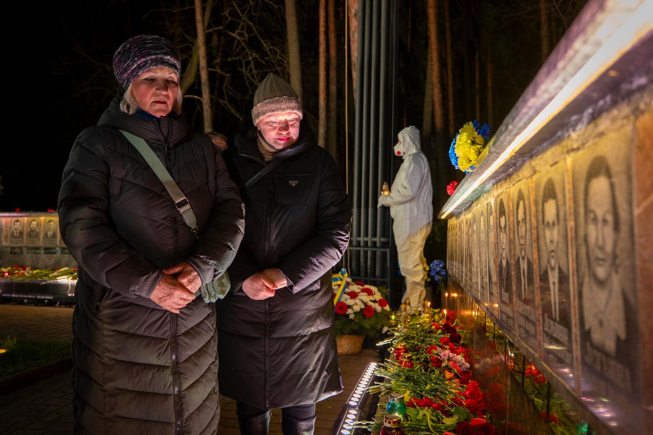 Residents of Ukrainian city mark 40 years since Chernobyl disaster ...
