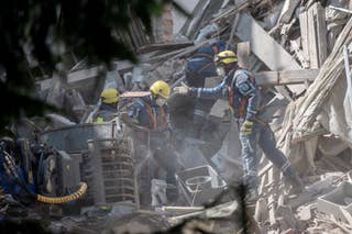 Rescuers search for three people missing after German building collapse ...