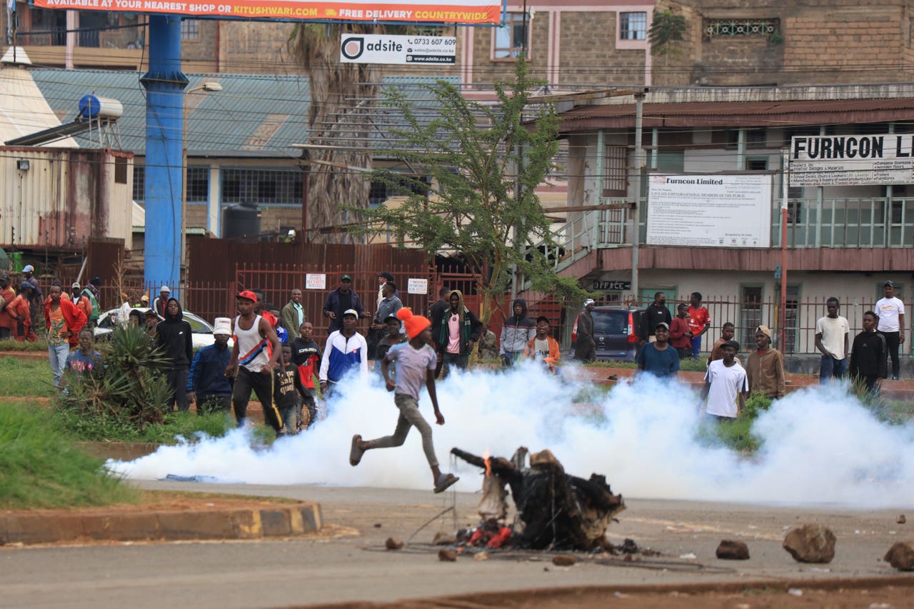 Four people killed and dozens injured in Kenya protests over record ...