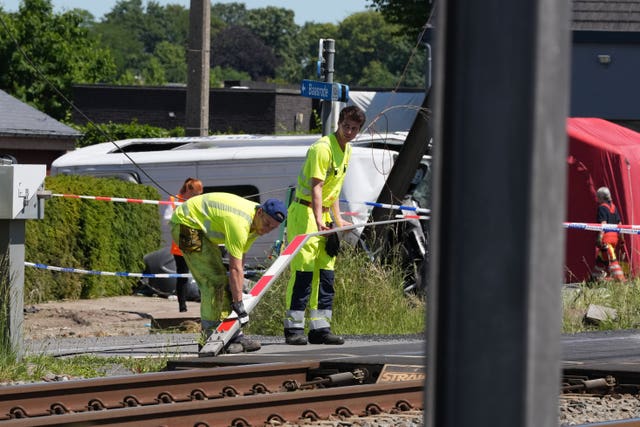 Four dead in crash between train and school bus in Belgium, officials ...