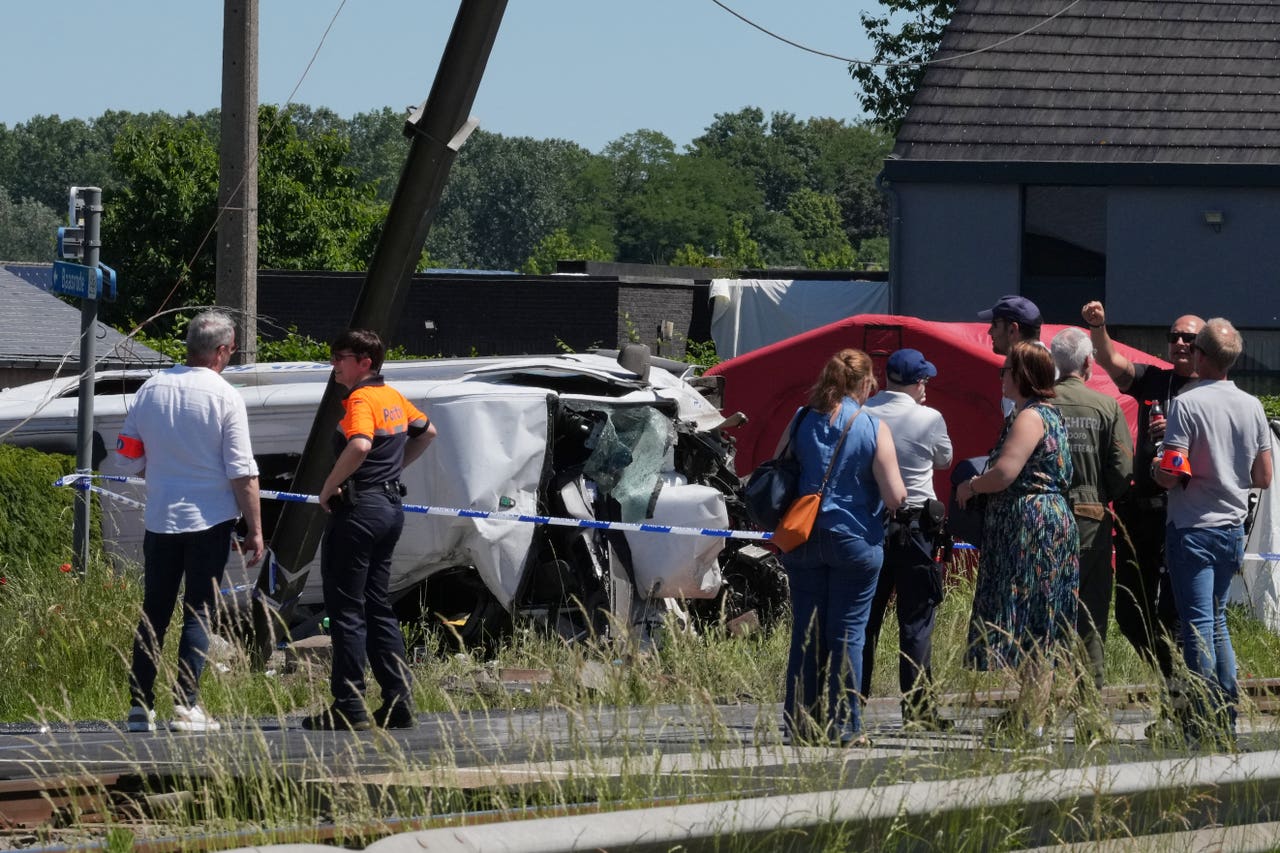 Four dead in crash between train and school bus in Belgium, officials ...