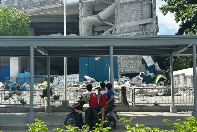 Dozens killed as quake destroys buildings and triggers tsunami in ...