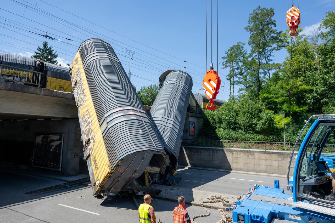 One dead as freight train goods wagons plunge off bridge | The Northern ...