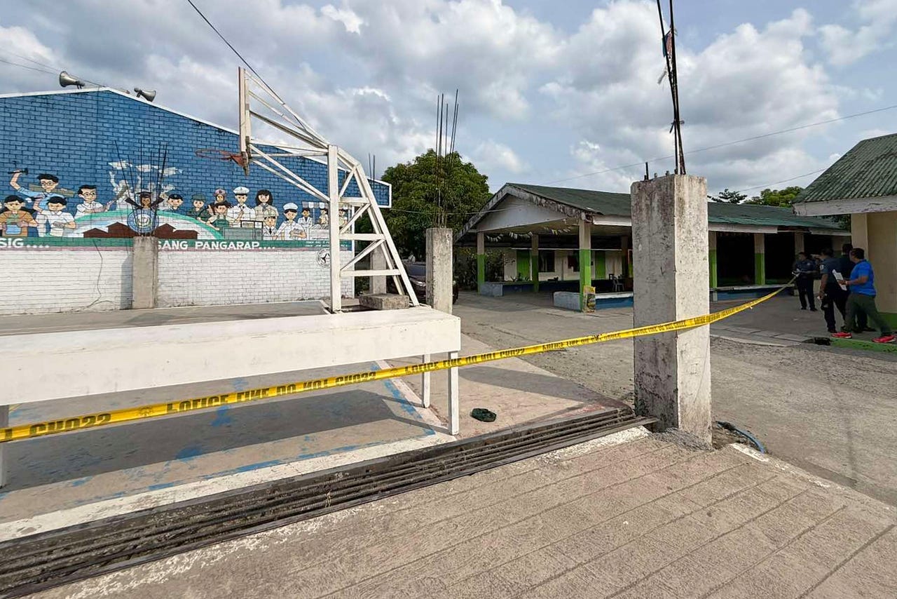 Two teenagers in custody after deadly shooting at Philippines school ...